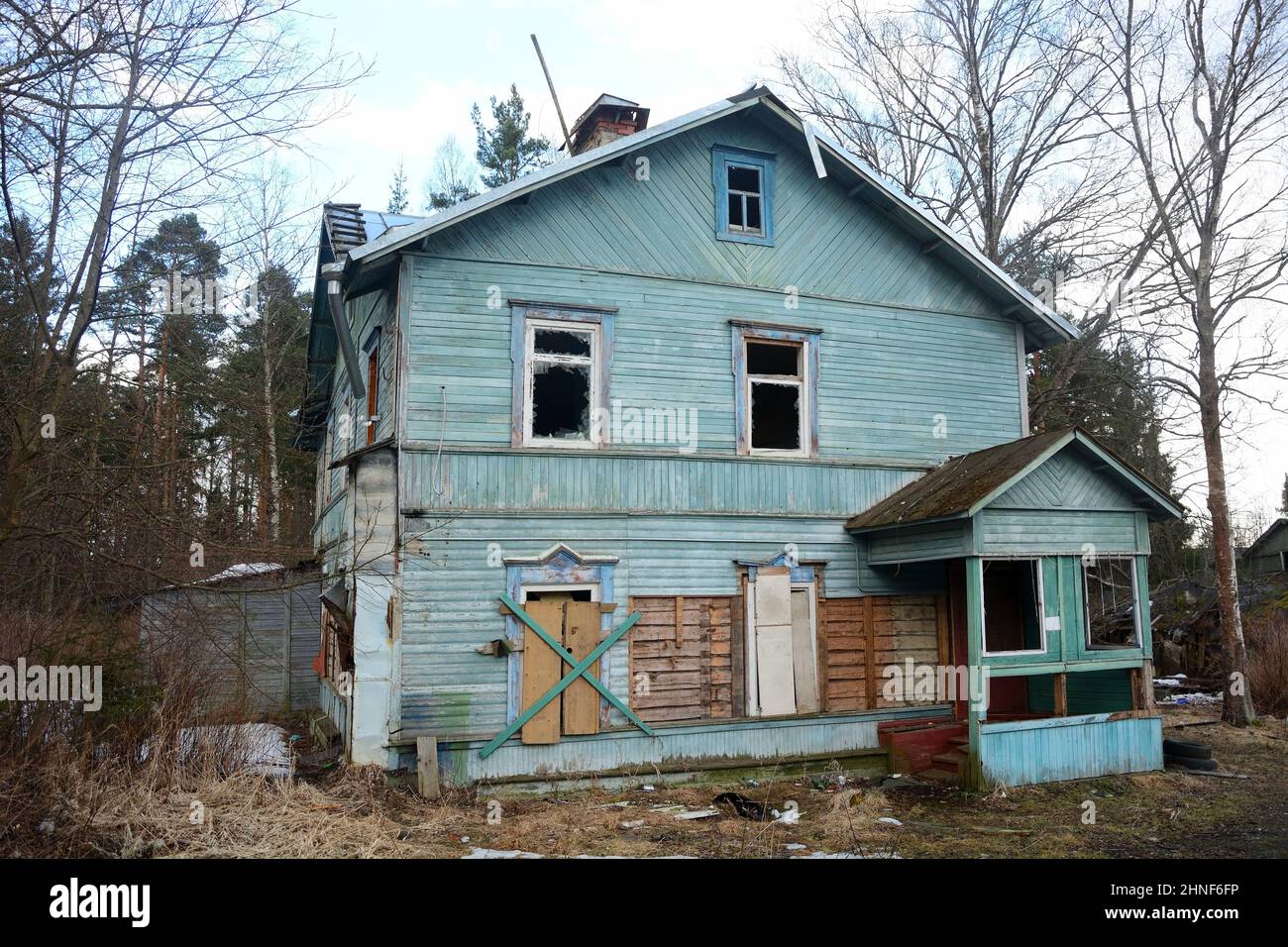 Old and abandoned wooden house in Zelenogorsk, Russia. Falling apart ...