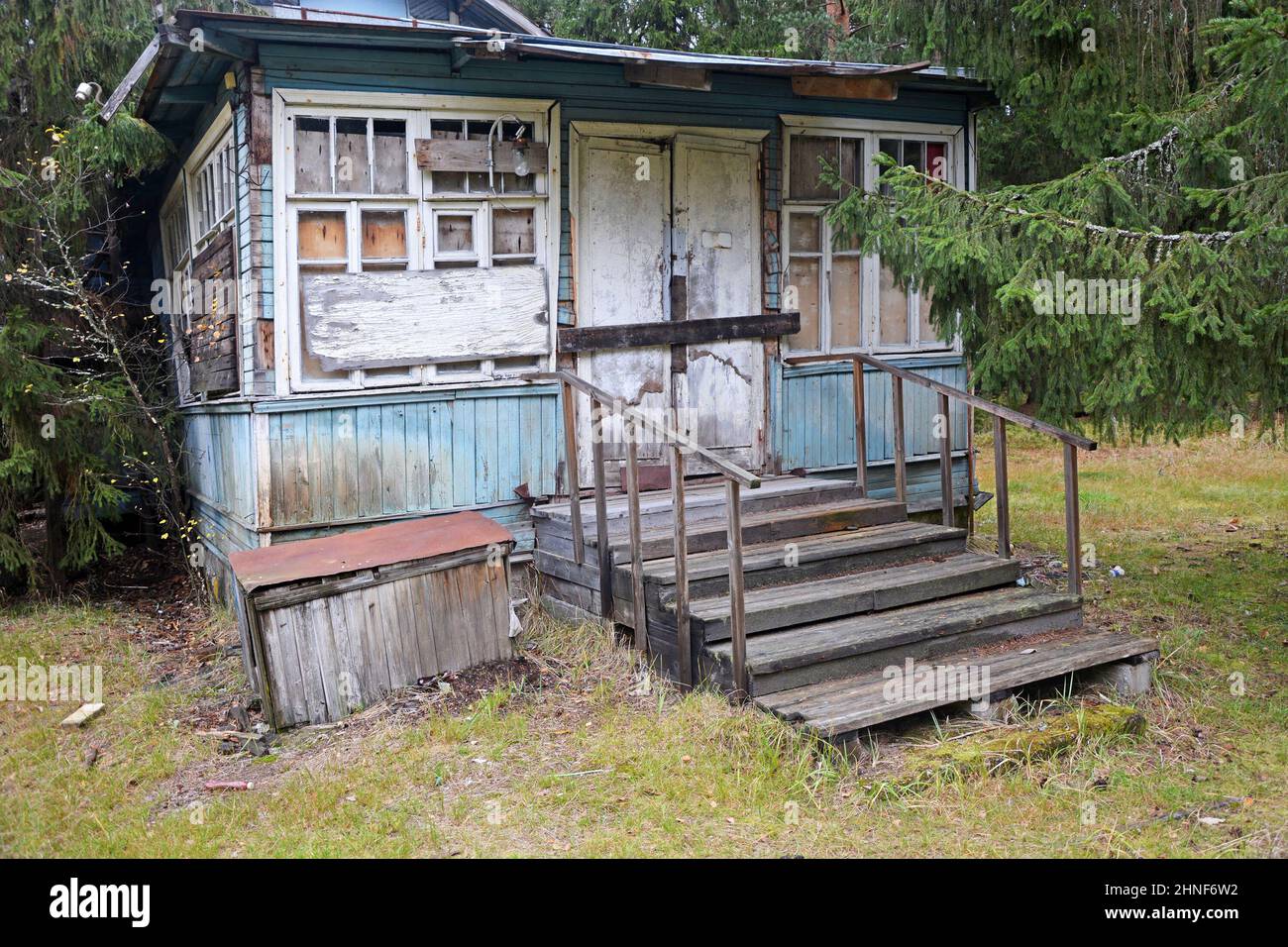 Old and abandoned wooden house in Zelenogorsk, Russia. Falling apart ...