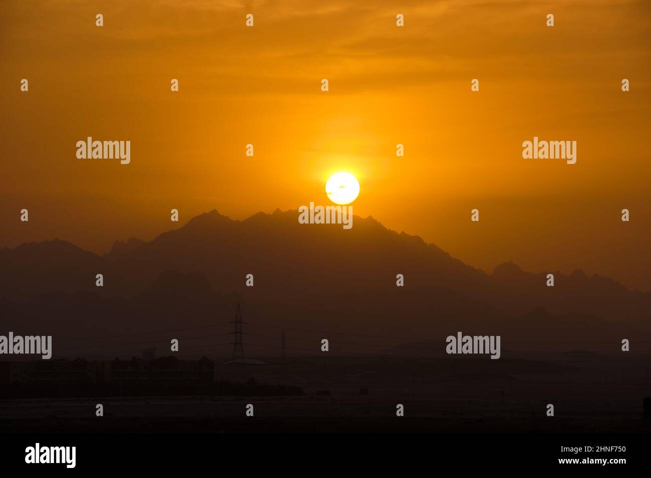 Beautiful evening panoramic landscape with bright setting sun over ...
