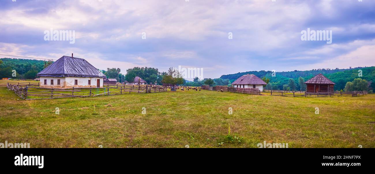 The grounds of Cossack Village Scansen with historic wooden farmhouses ...