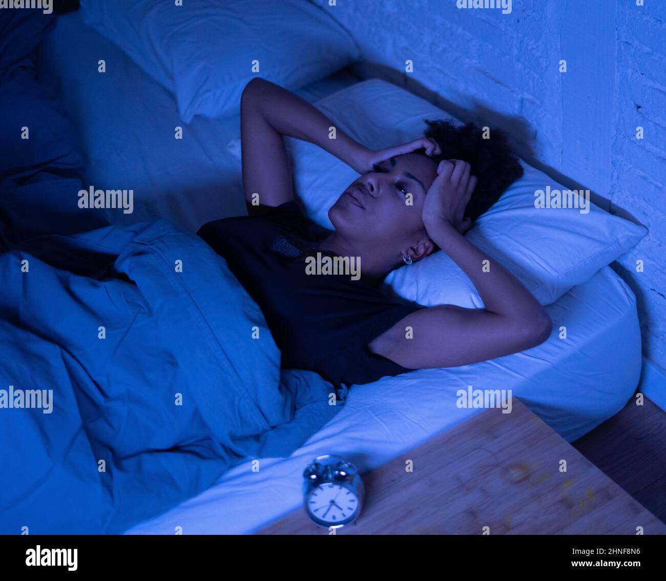 Woman can't sleep scared hi-res stock photography and images - Alamy