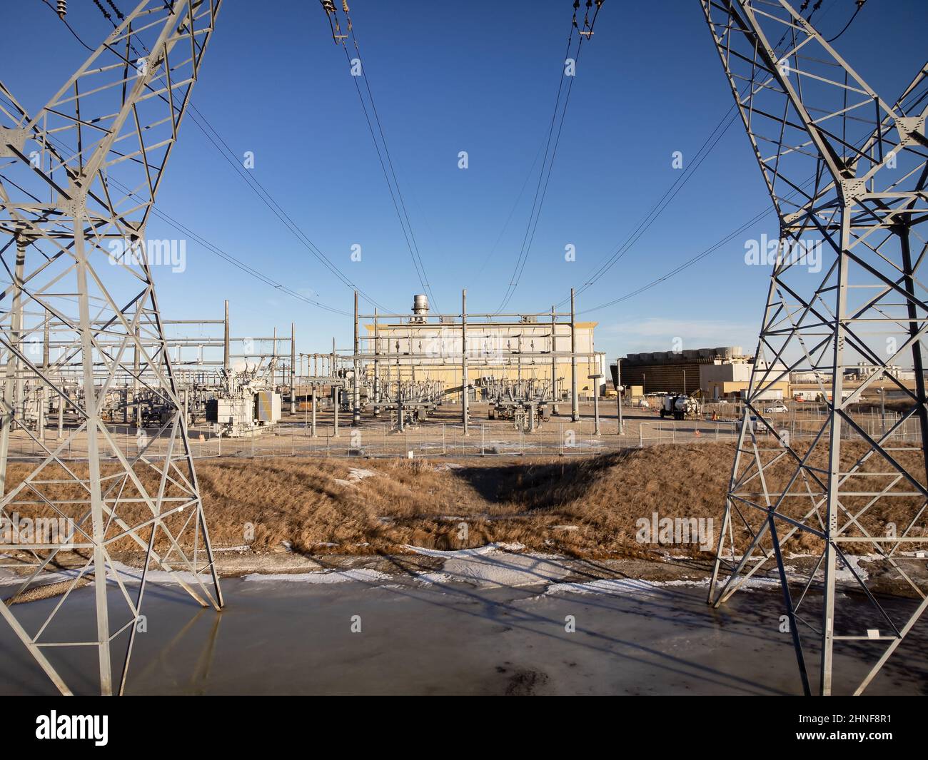 Transmission towers and a natural gas power generation plant in Alberta ...