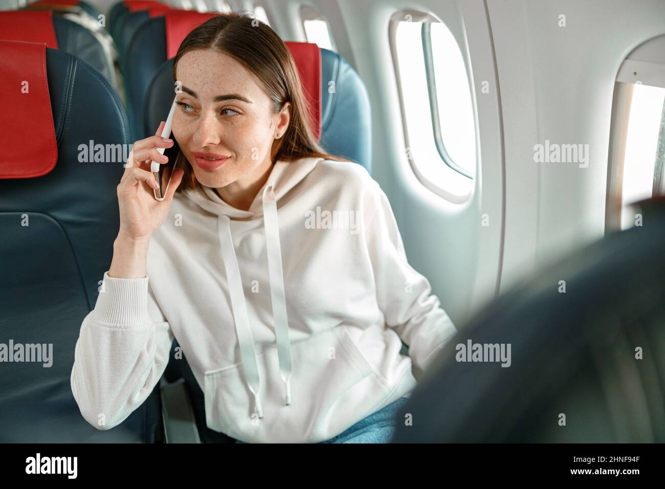 Woman talking plane hi-res stock photography and images - Alamy