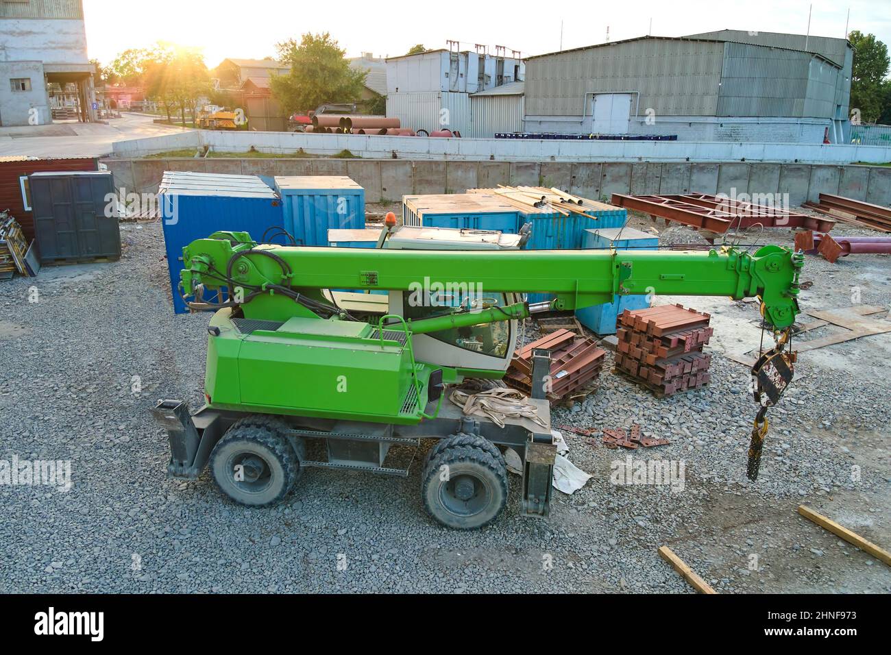 Lifting crane tractor on industrial construction site. Heavy duty ...