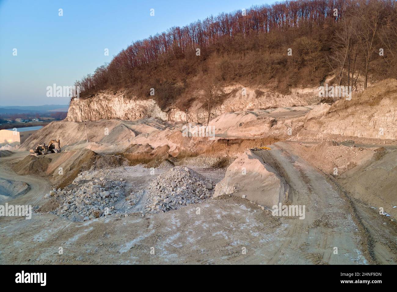 Open pit mining of construction sand stone materials Stock Photo - Alamy