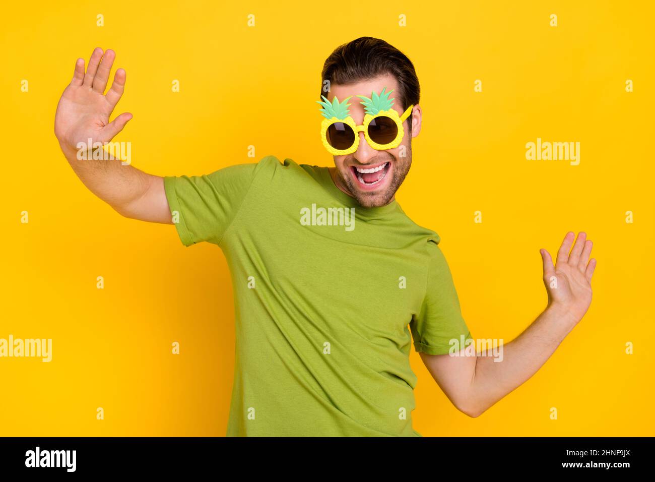 Photo of youth excited guy have fun dancer eyewear tropical theme-party ...