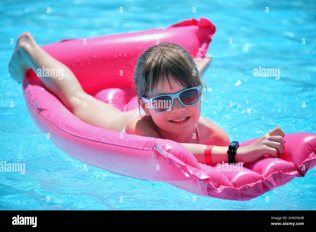 Girl floating in inflatable raft hi-res stock photography and images ...