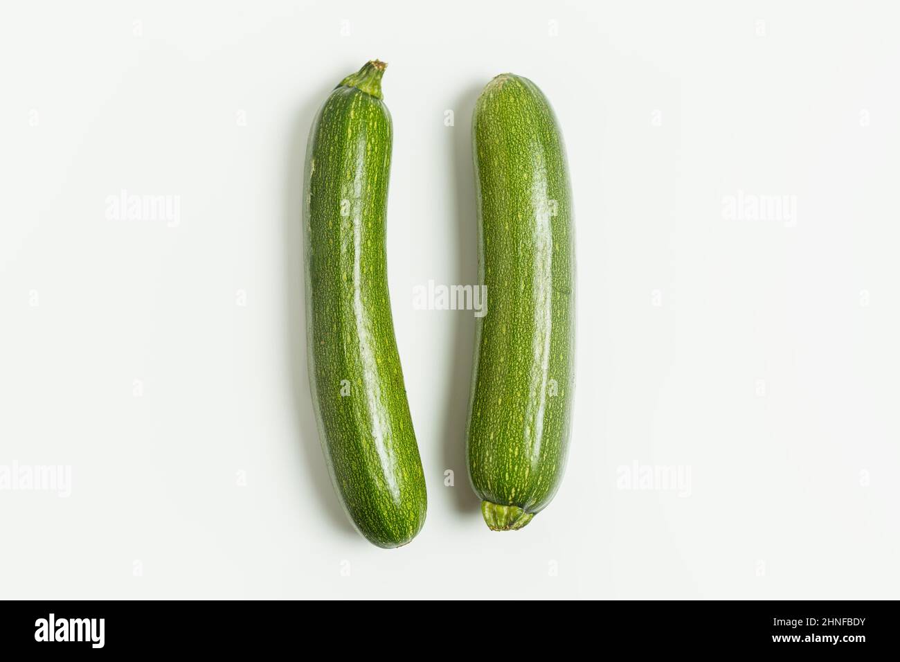 Zucchini isolated on white background Stock Photo - Alamy