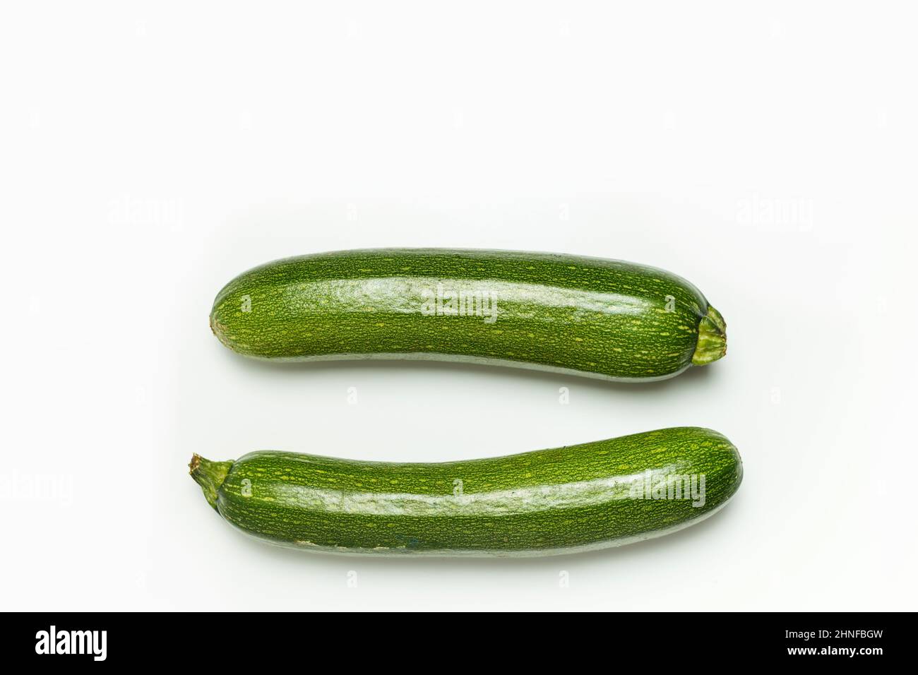 Zucchini isolated on white background Stock Photo - Alamy