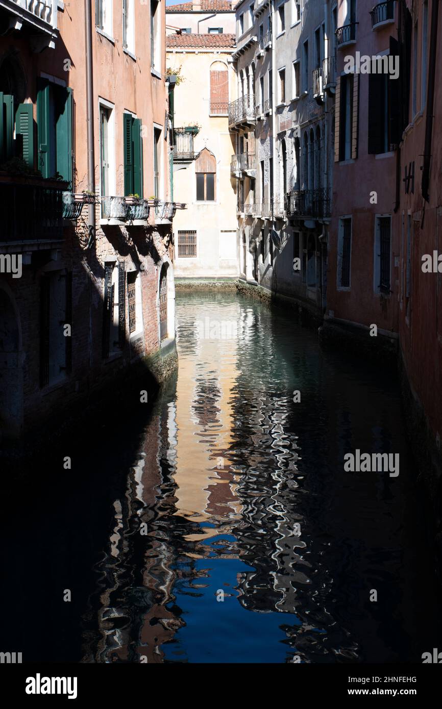 Reflections on water in side canal , Venice Stock Photo - Alamy