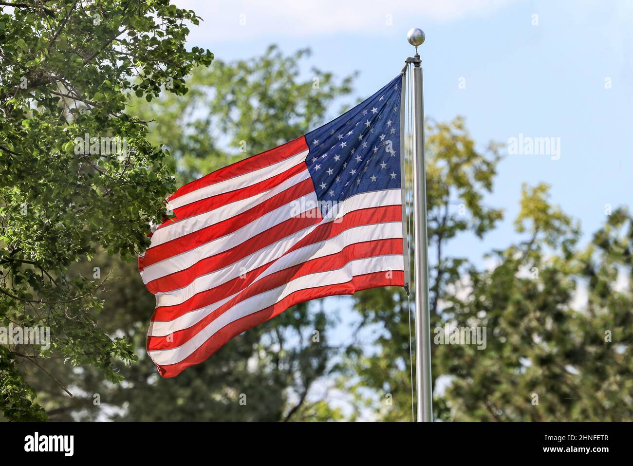 Waving American Flag In Sky