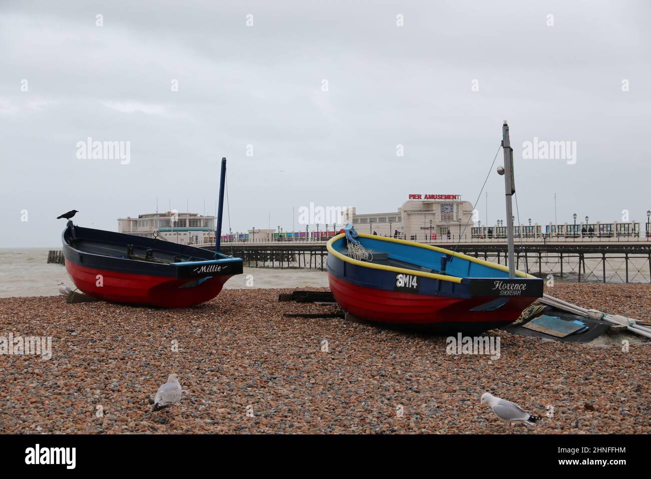 BOATS AND PIER IN WORTHING Stock Photo - Alamy