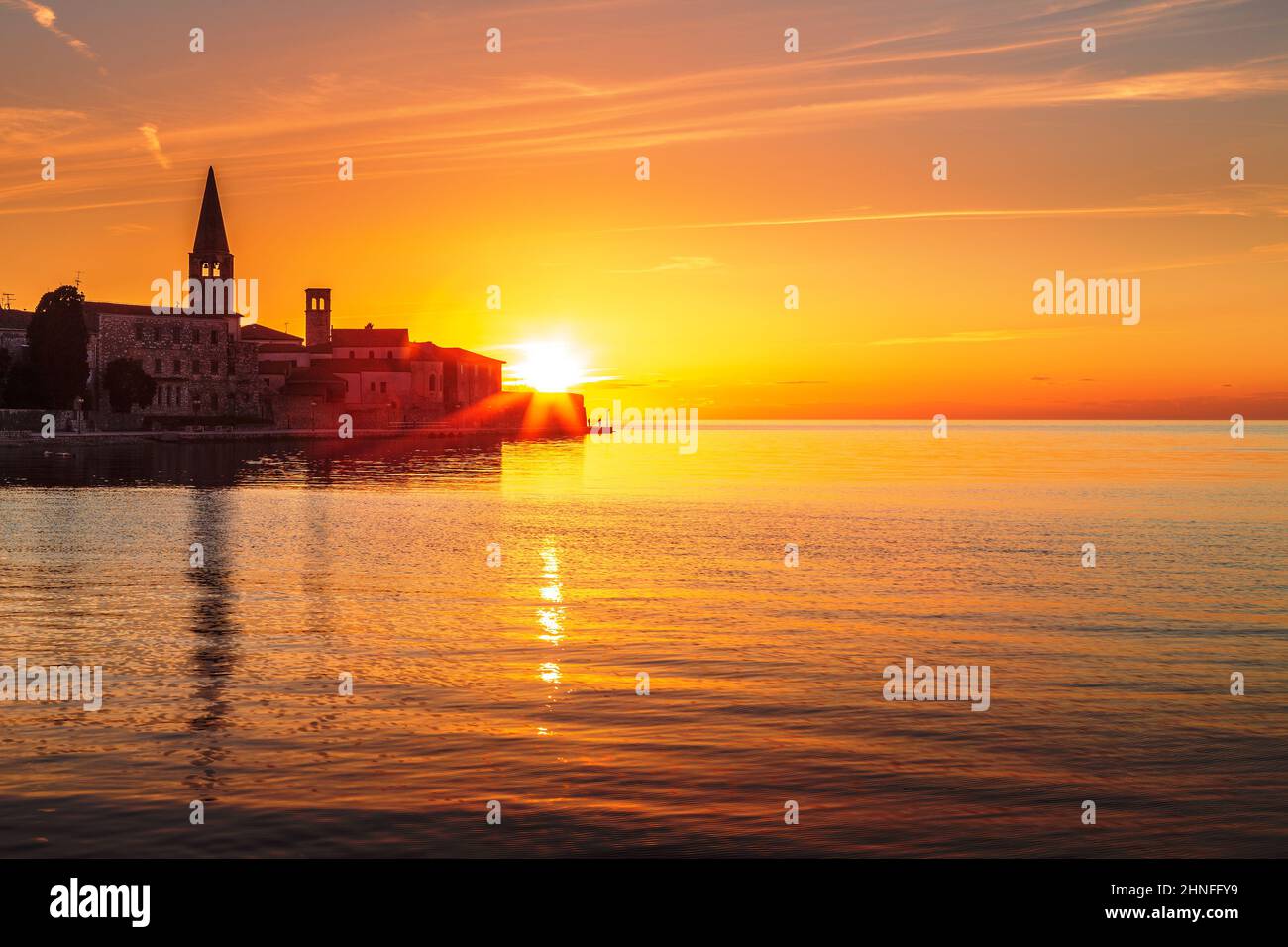 View on a historic center of Porec town and sea at sunset, Croatia ...