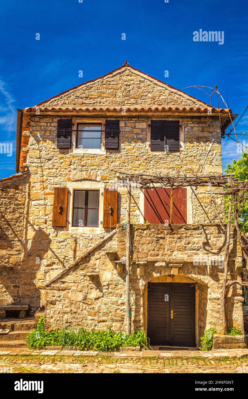 Stone facade of ancient house. The Groznjan village on Istria in ...