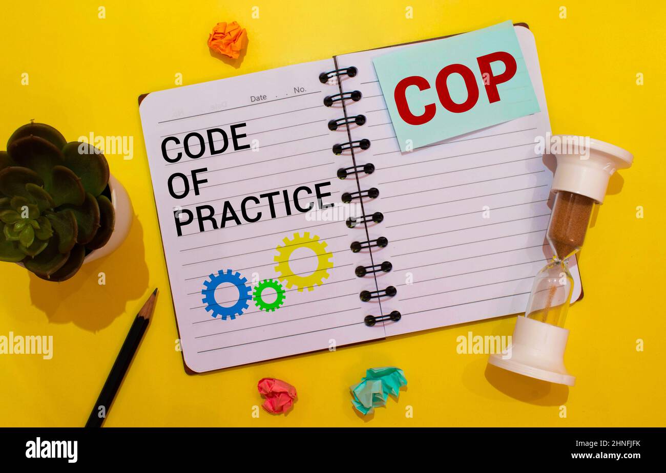 text Code of Practice on envelope on keyboard on white background Stock ...