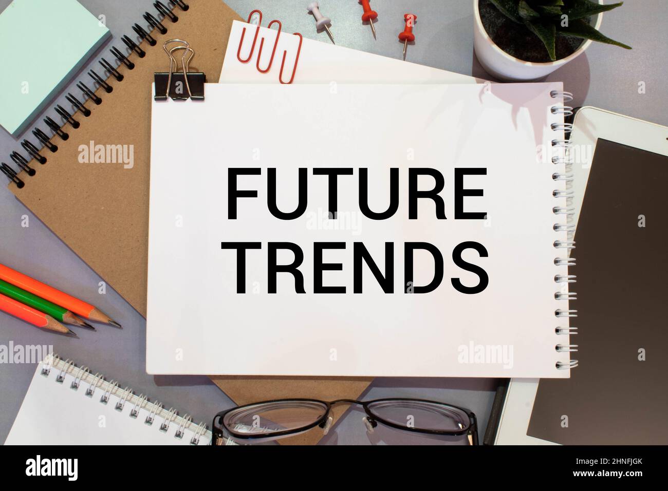 Notebook with Tools and Notes with text FUTURE TRENDS Stock Photo - Alamy