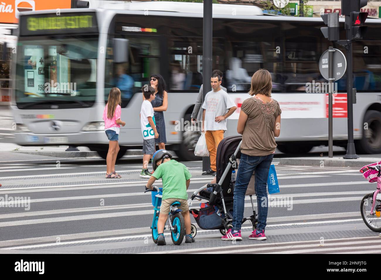 Mobility in the city of Vitoria, bus, cars and people moving around the ...