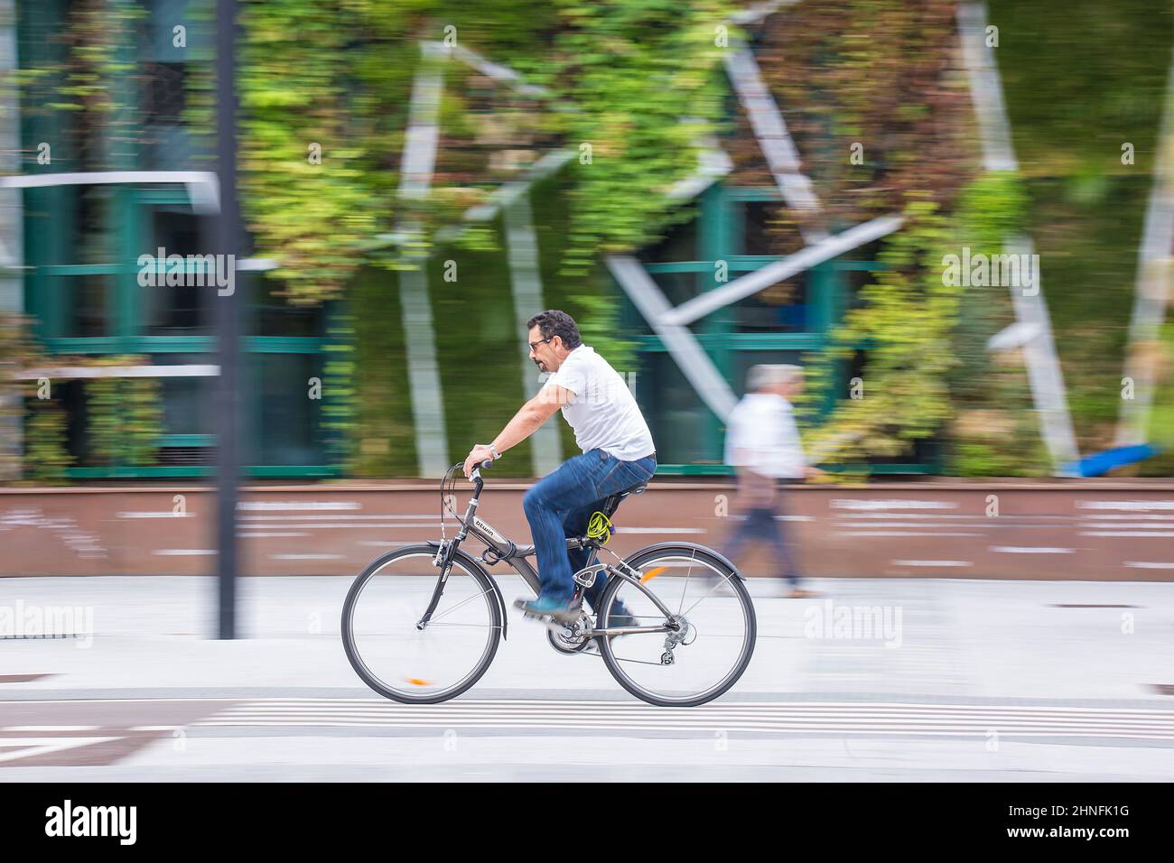 Mobility in the city Vitoria, bicycles, cars and people moving around ...