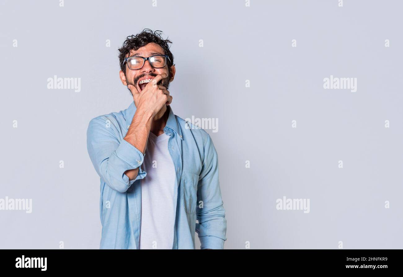 Man in glasses laughing with isolated background, attractive guy ...