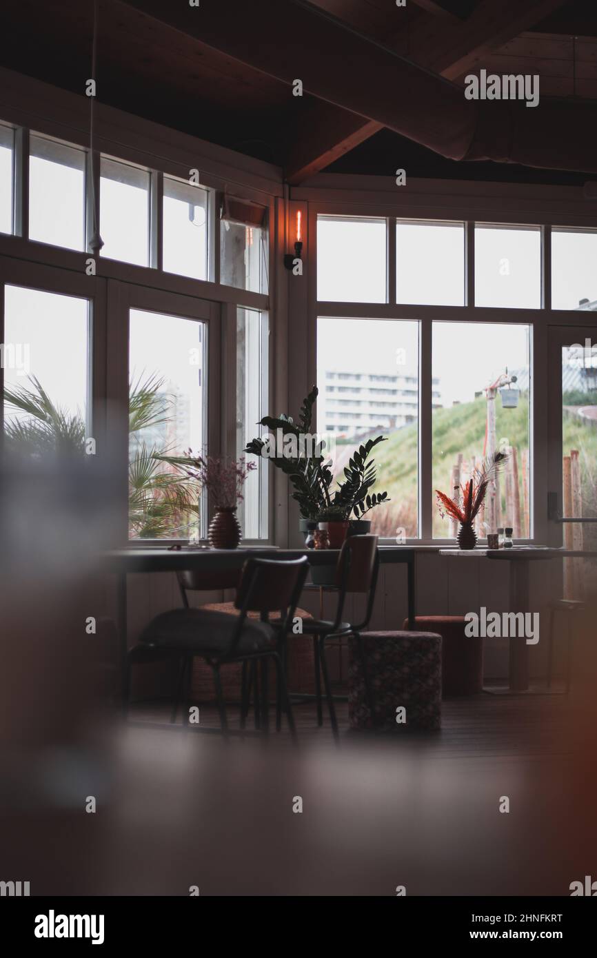 Perspective shot of an interior with panoramic windows Stock Photo - Alamy