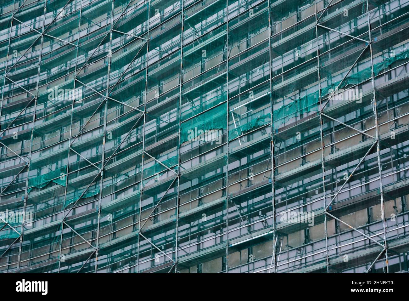 View of scaffolding on a building during renovation Stock Photo - Alamy