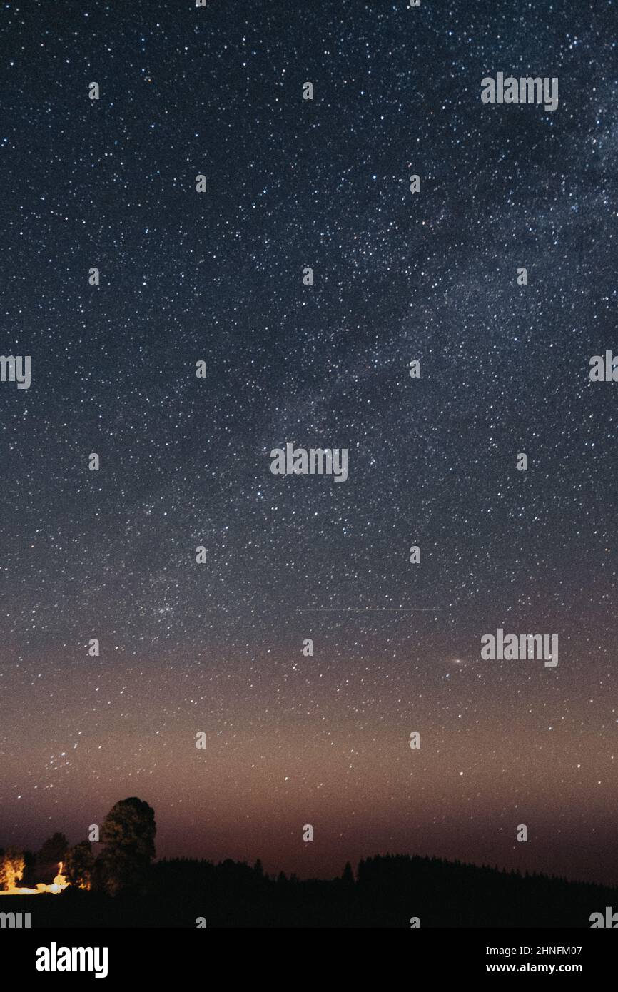 Beautiful view of a colorful starry night sky Stock Photo - Alamy