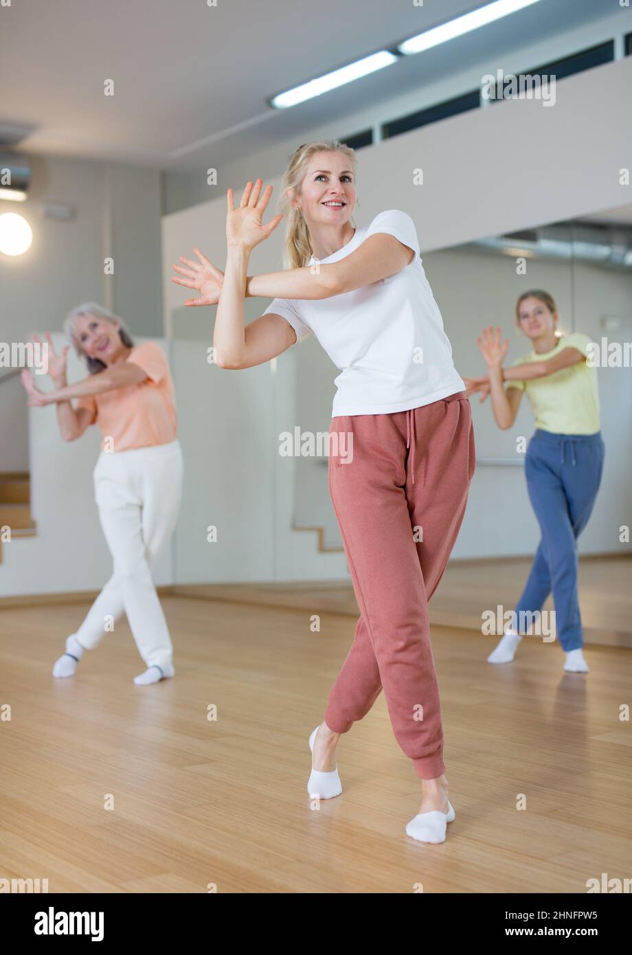 Woman moving dancing motion during hi-res stock photography and images ...