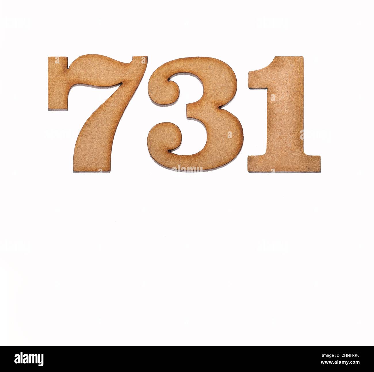Number 731 in wood, isolated on white background Stock Photo - Alamy