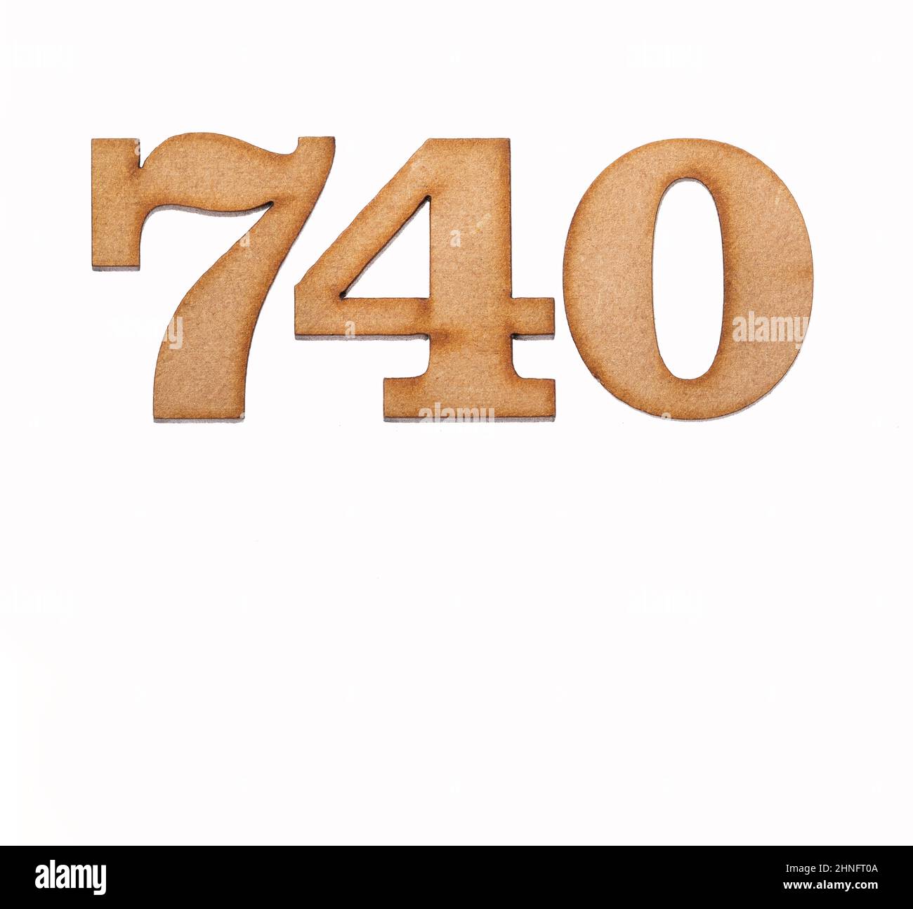 Number 740 - Piece of wood isolated on white background Stock Photo - Alamy