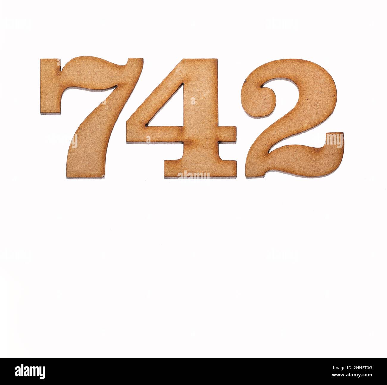 Number 742 - Piece of wood isolated on white background Stock Photo - Alamy