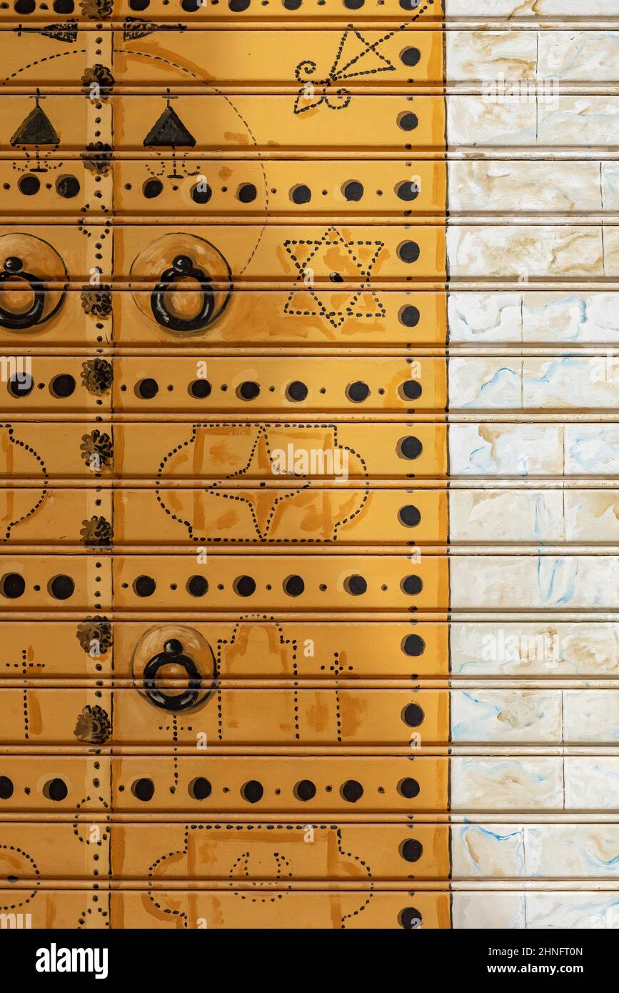 Colorful painted roller shutters on shop window, Kasbah Mazara del ...
