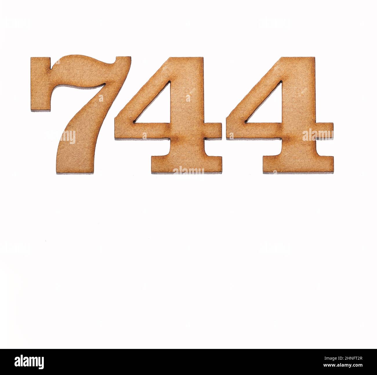 Number 744 - Piece of wood isolated on white background Stock Photo - Alamy