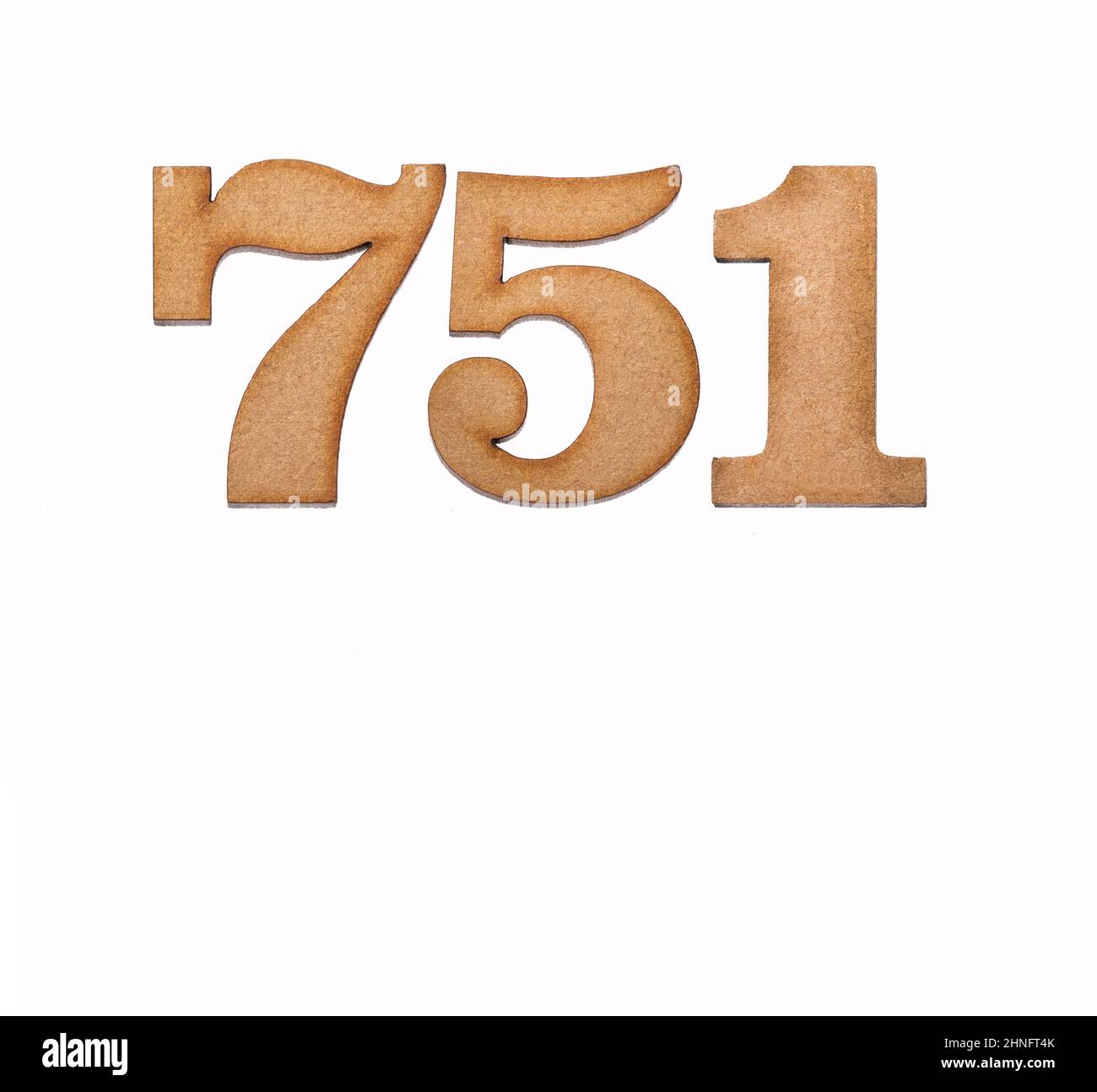 Number 751 in wood, isolated on white background Stock Photo - Alamy