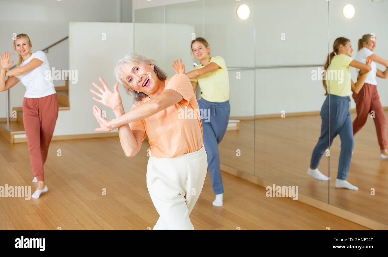 Woman aged 65 dancing hi-res stock photography and images - Alamy