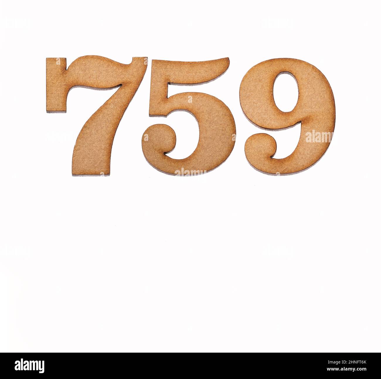 Number 759 in wood, isolated on white background Stock Photo - Alamy