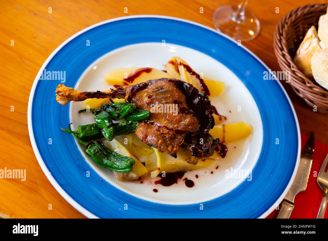 Duck confit in port with pear chutney Stock Photo - Alamy