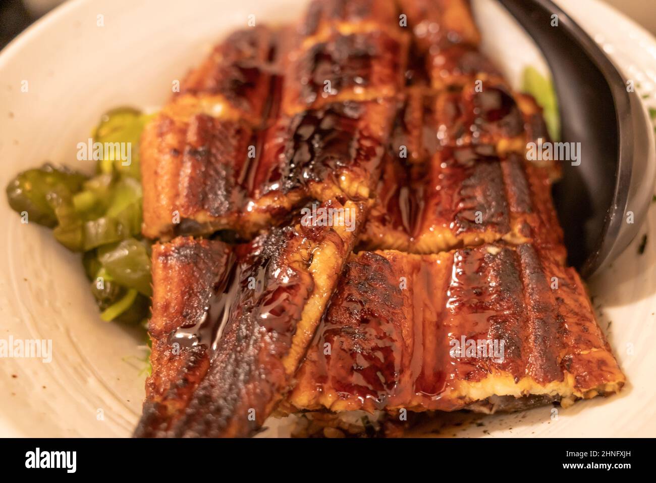 Unagi Don, Japanese grilled eel with teriyaki sauce serve with rice, simmer egg and Miso soup ...