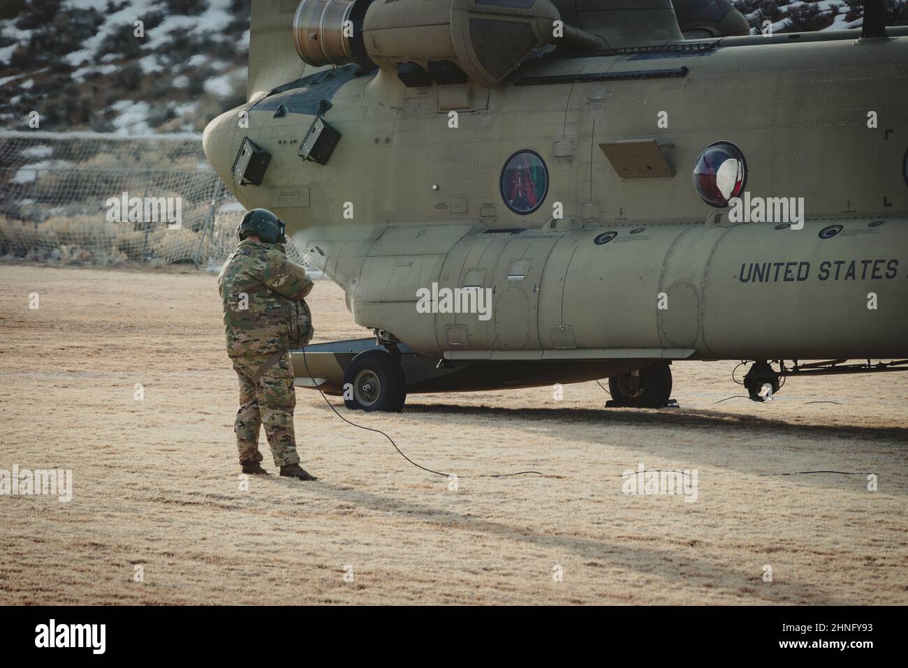 A Nevada Army National Guard CH-47 Chinook helicopter sits on a field ...