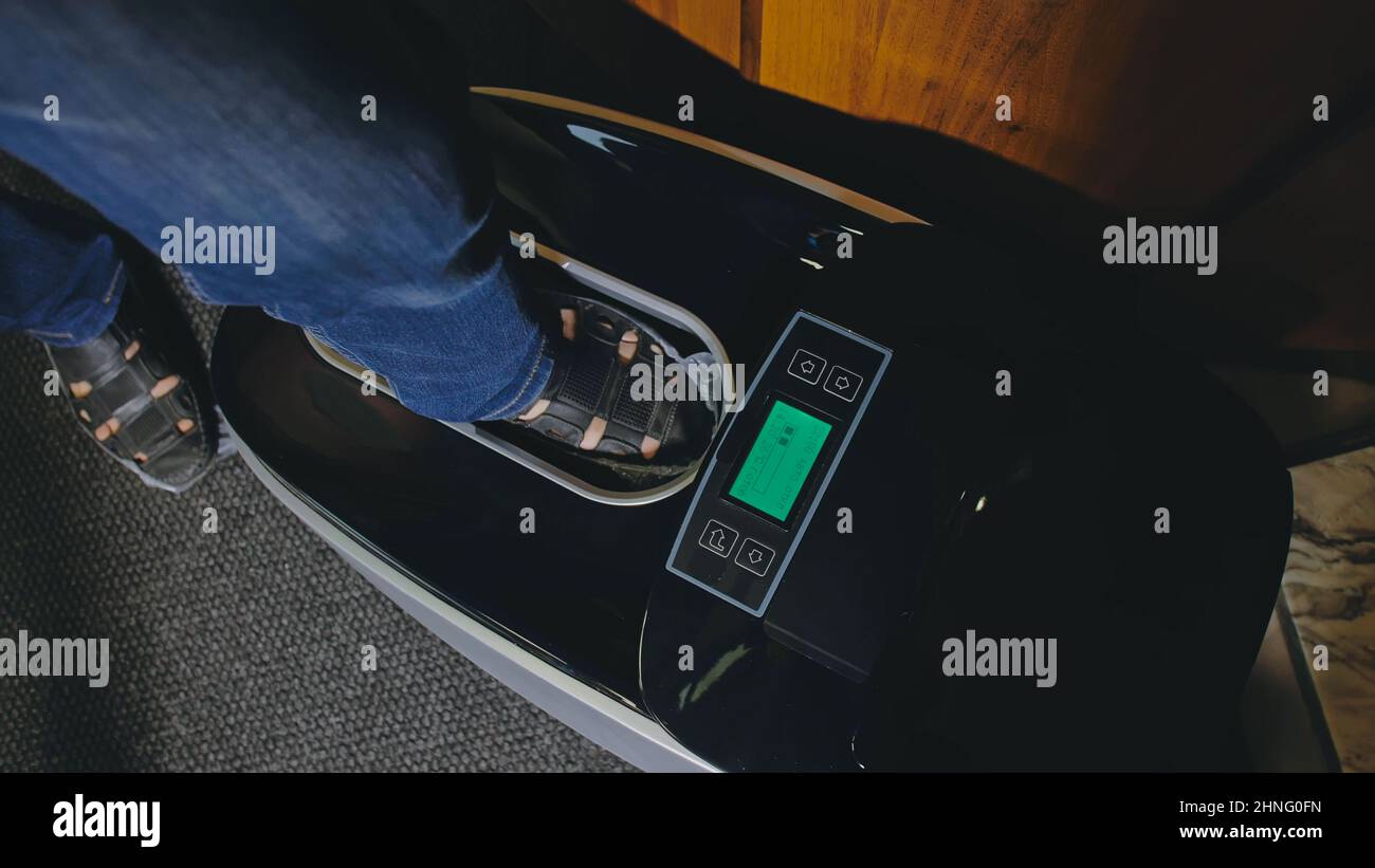 Automatic Thermal Shrinkable Shoe Cover Laminating Machine. Close up ...