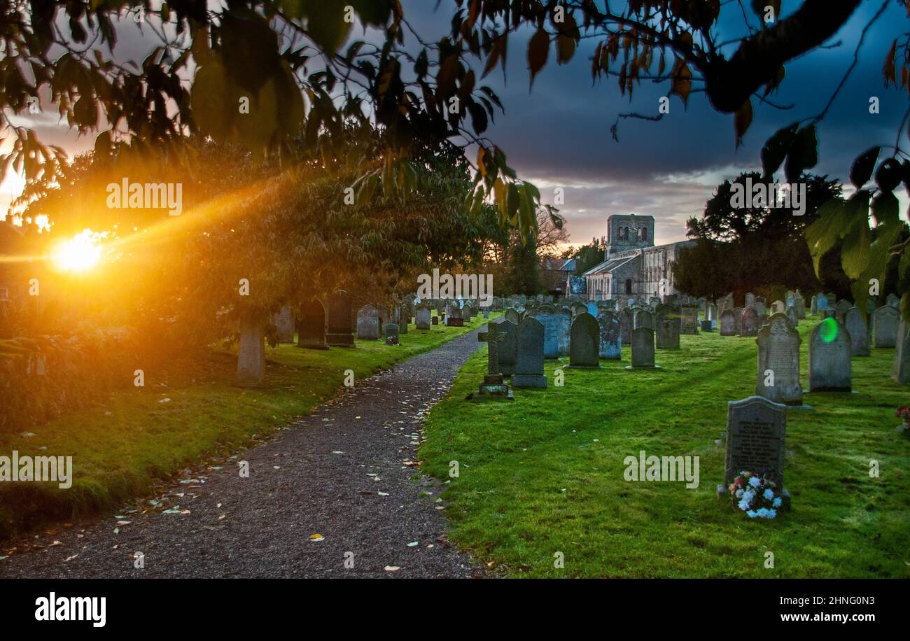 Sunset at Norham St Cuthbert's Church and churchyard, Northumberland ...