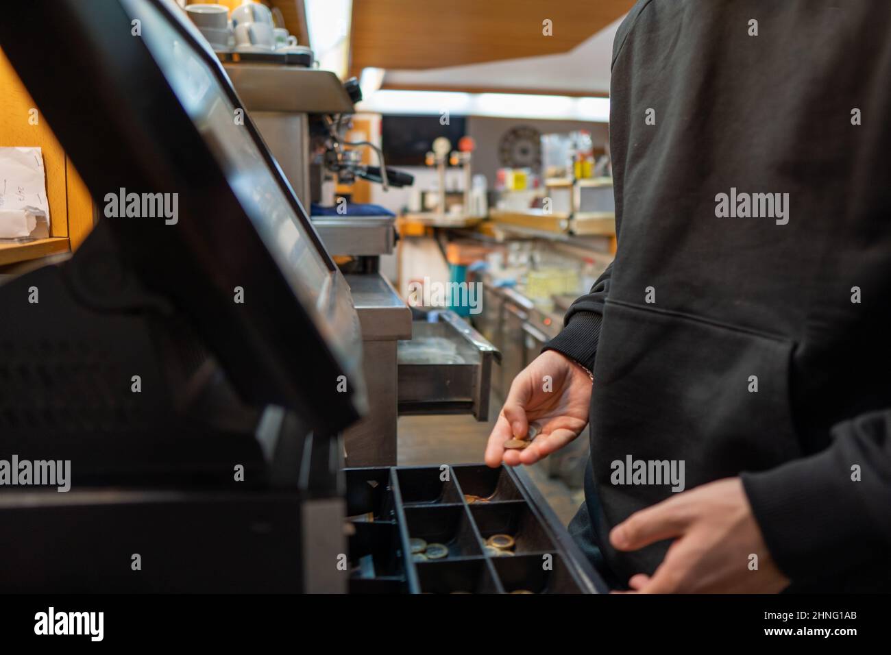 Boy cash pay counter hi-res stock photography and images - Alamy