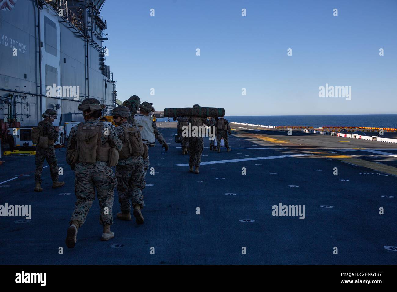 U.S. Marines with 3rd Low Altitude Air Defense (LAAD) transport a ...