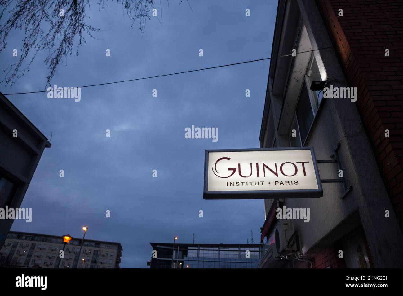 Picture of a sign with the logo of Guinot on their shop in Belgrade ...