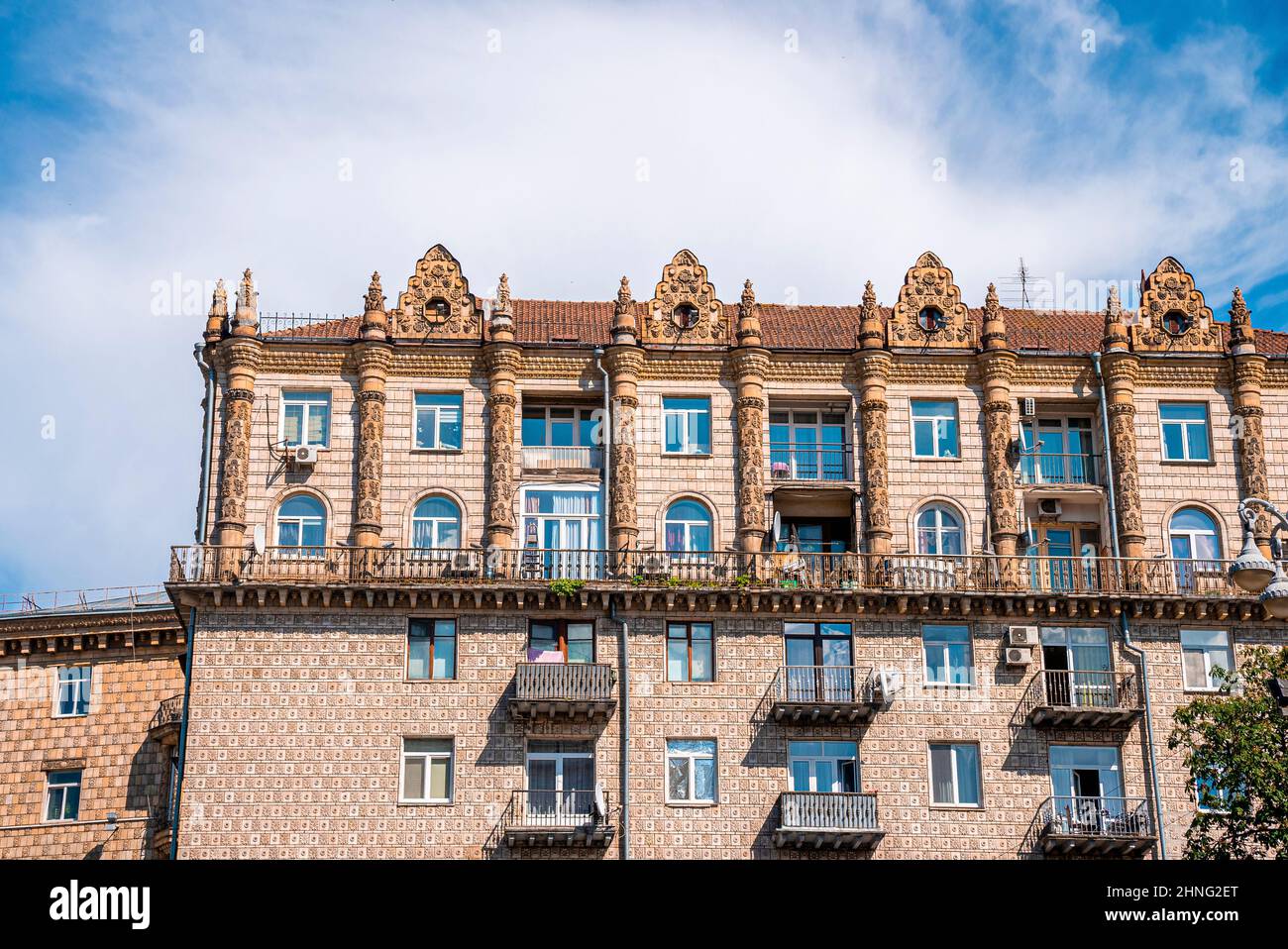 Facade of the building with windows and fence built in Soviet times ...