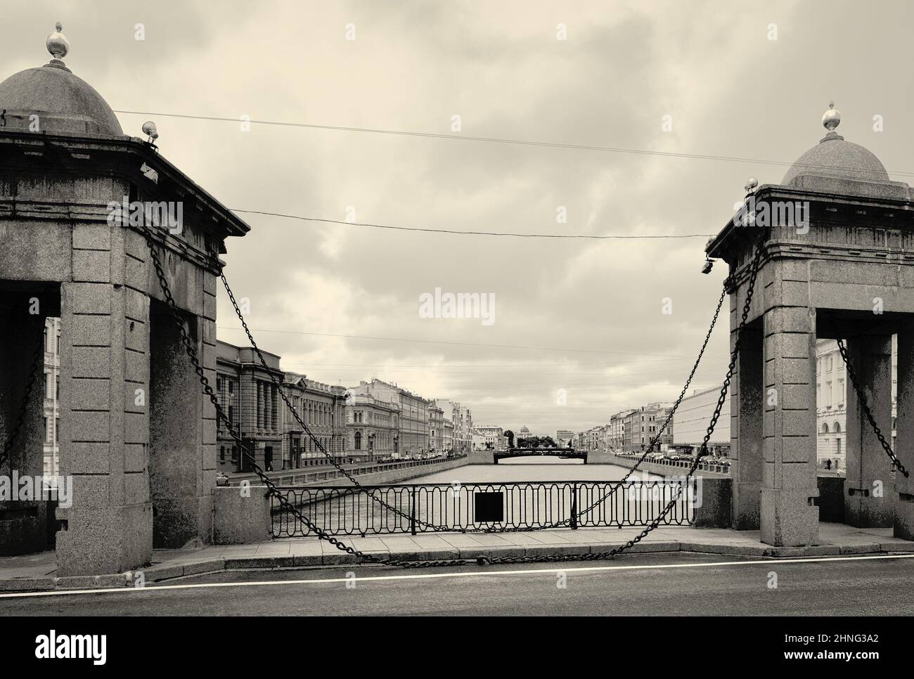 Lomonosov bridge over the Fontanka river. Granite tetrapylon with ...