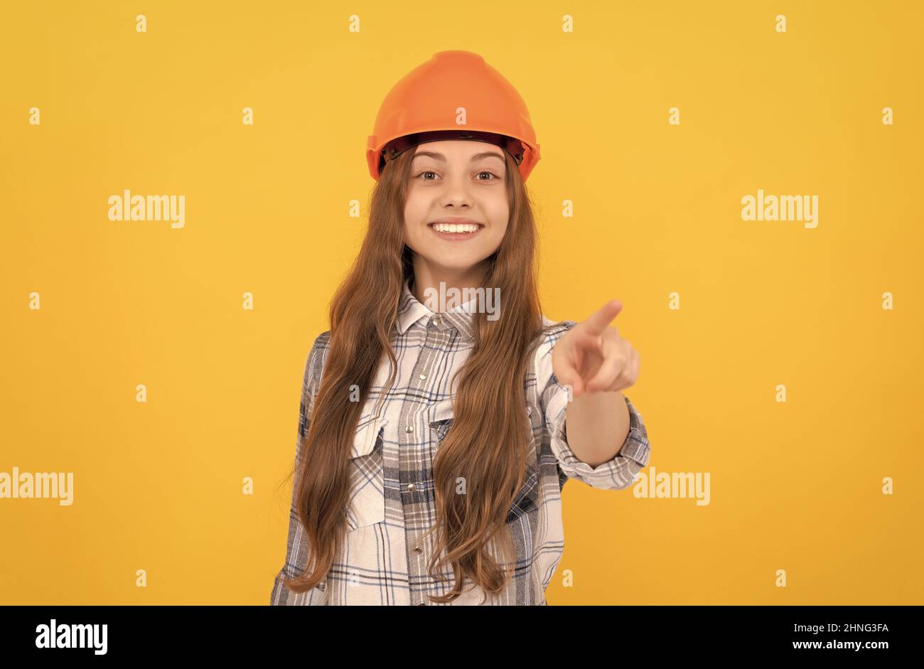 future career. teen girl in helmet. builder kid in checkered shirt ...
