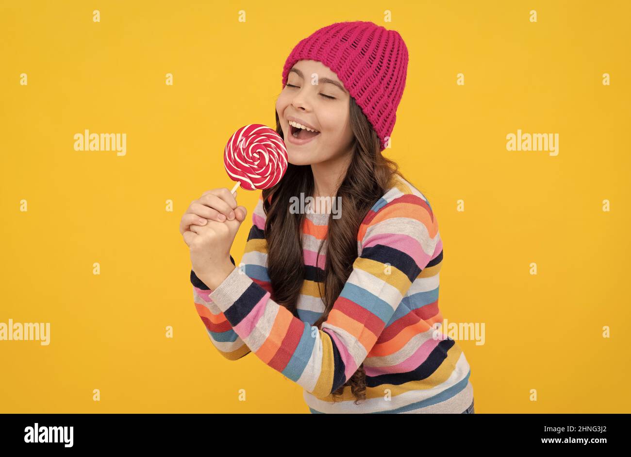 yummy. happy teen girl singer hold lollipop. lollipop lady. hipster kid ...