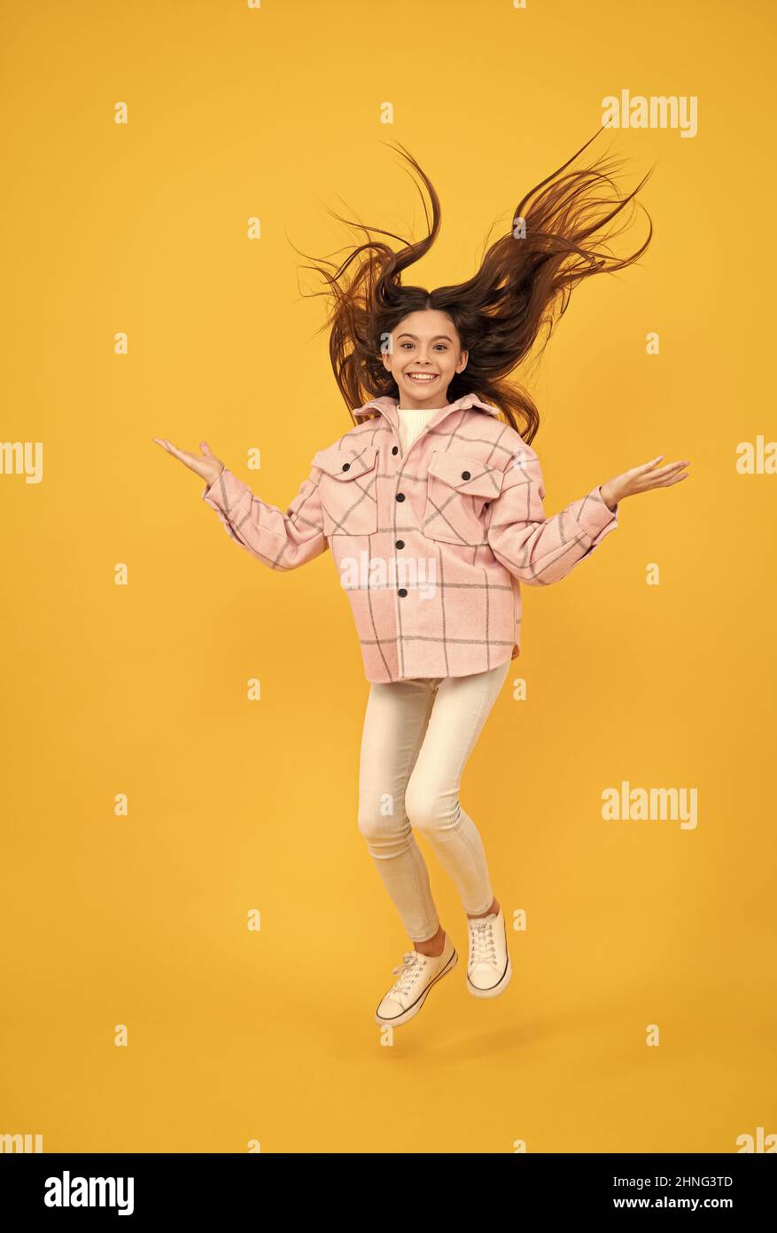 just having fun. express happiness. happy childhood. happy girl in pink ...