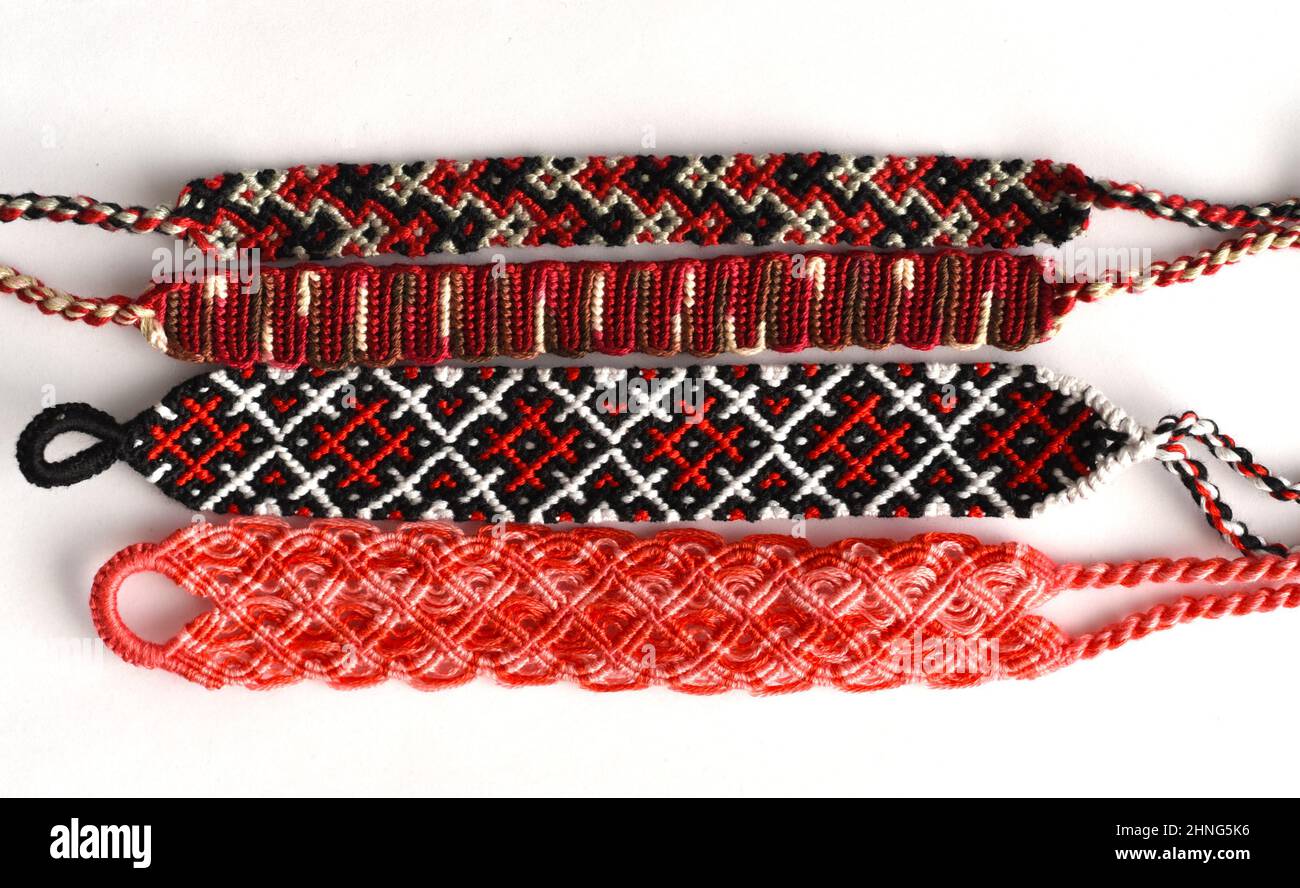 Woven DIY friendship bracelets handmade of embroidery floss with knots ...