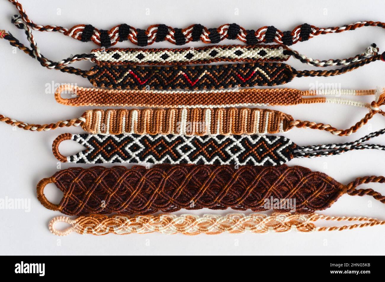 Woven DIY friendship bracelets handmade of embroidery floss with knots ...